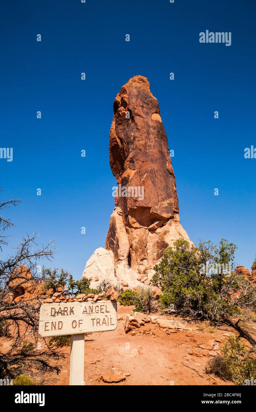 A end of trail sign at Dark Angel, a sandstone tower with a man rock ...