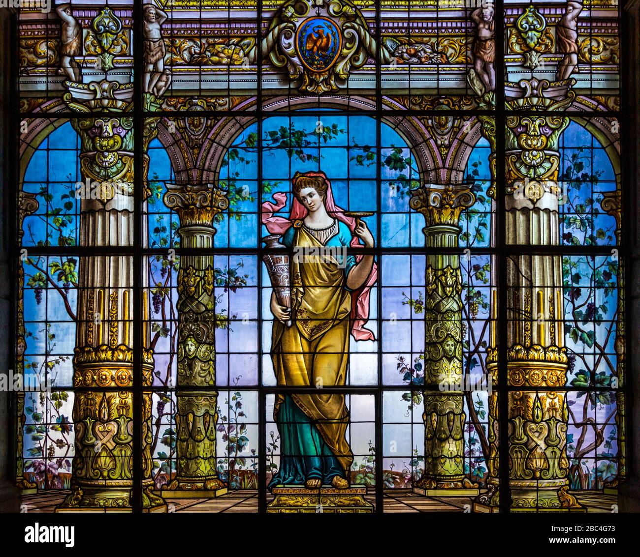 Hallway lined with ornate stain glass murals, at Chapultepec Castle, in ...