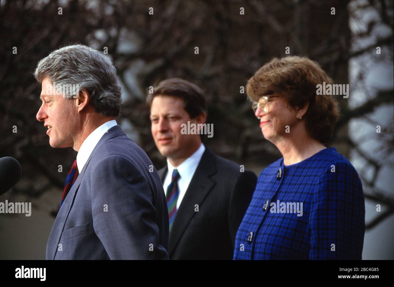 United States President Bill Clinton, left, answers reporter's ...