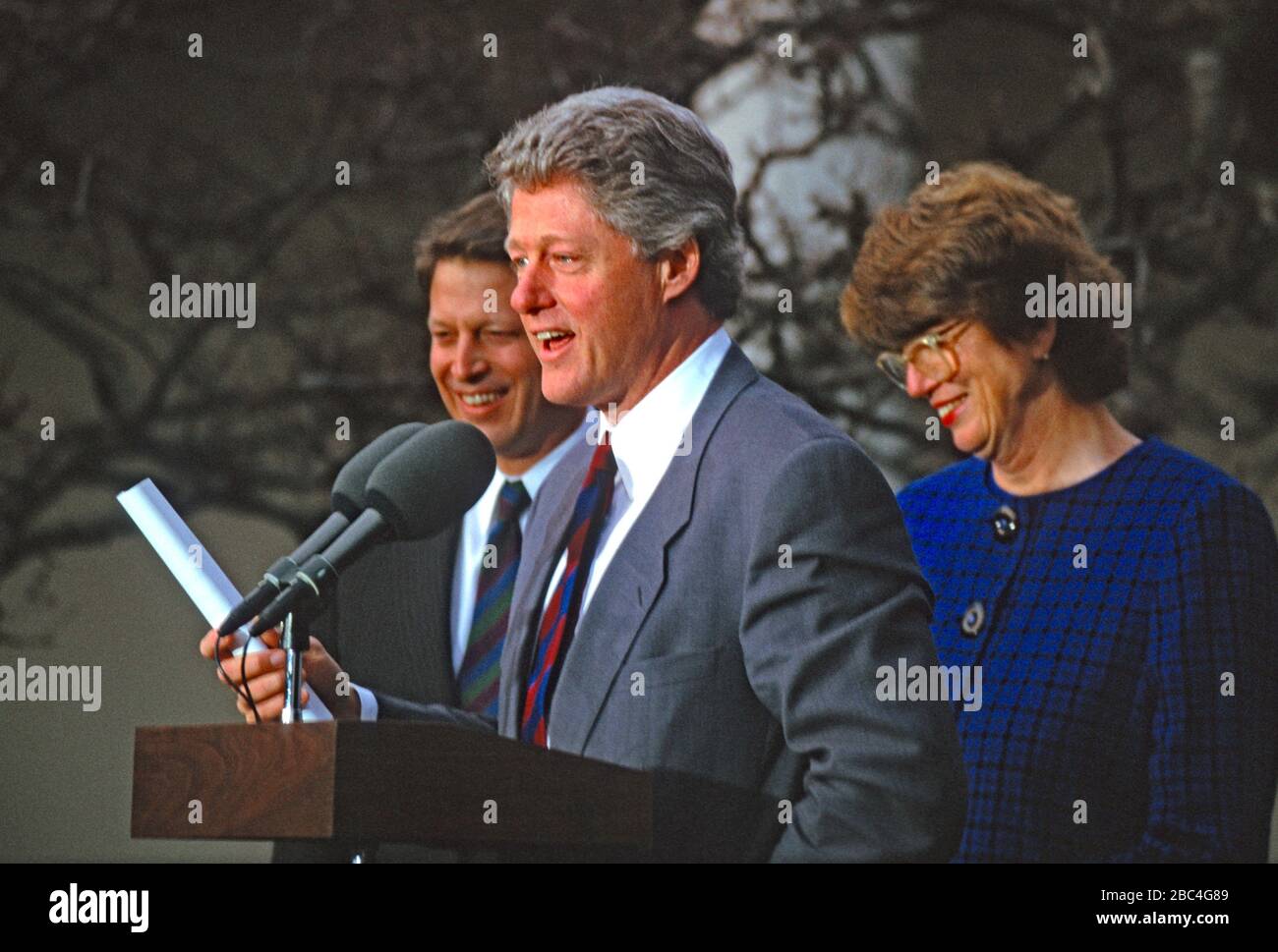 United States President Bill Clinton, center, answers reporter's ...