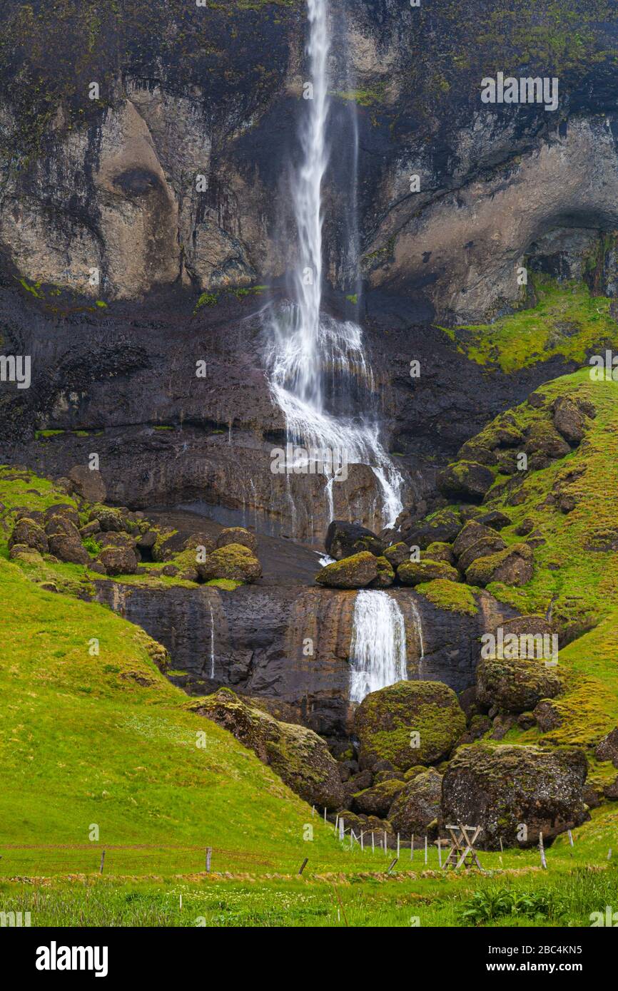 Small waterfall seen from the coastal road of southern Iceland Stock ...