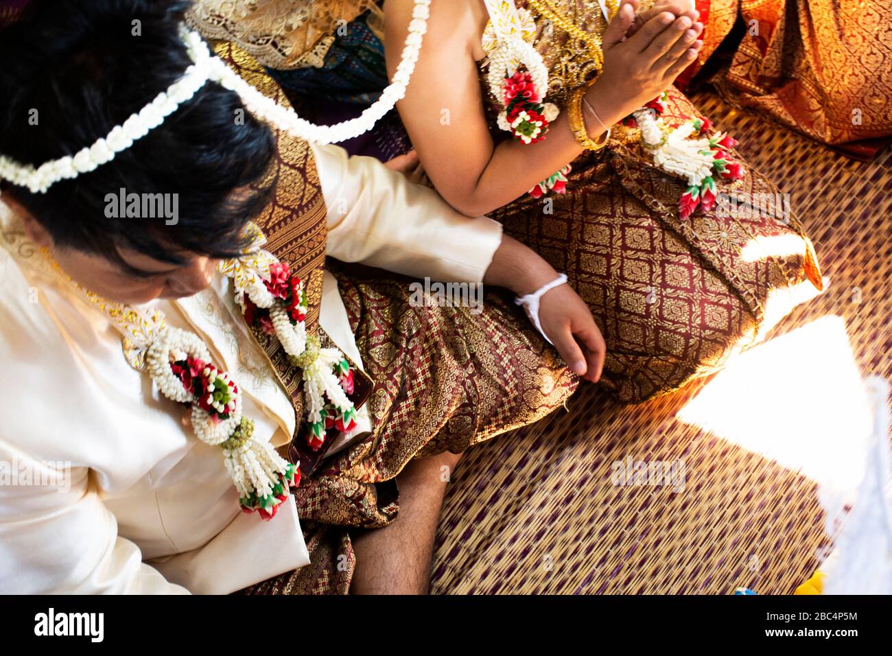 YASOTHON, THAILAND - JANUARY 12 : Thai relatives and friends join and ...