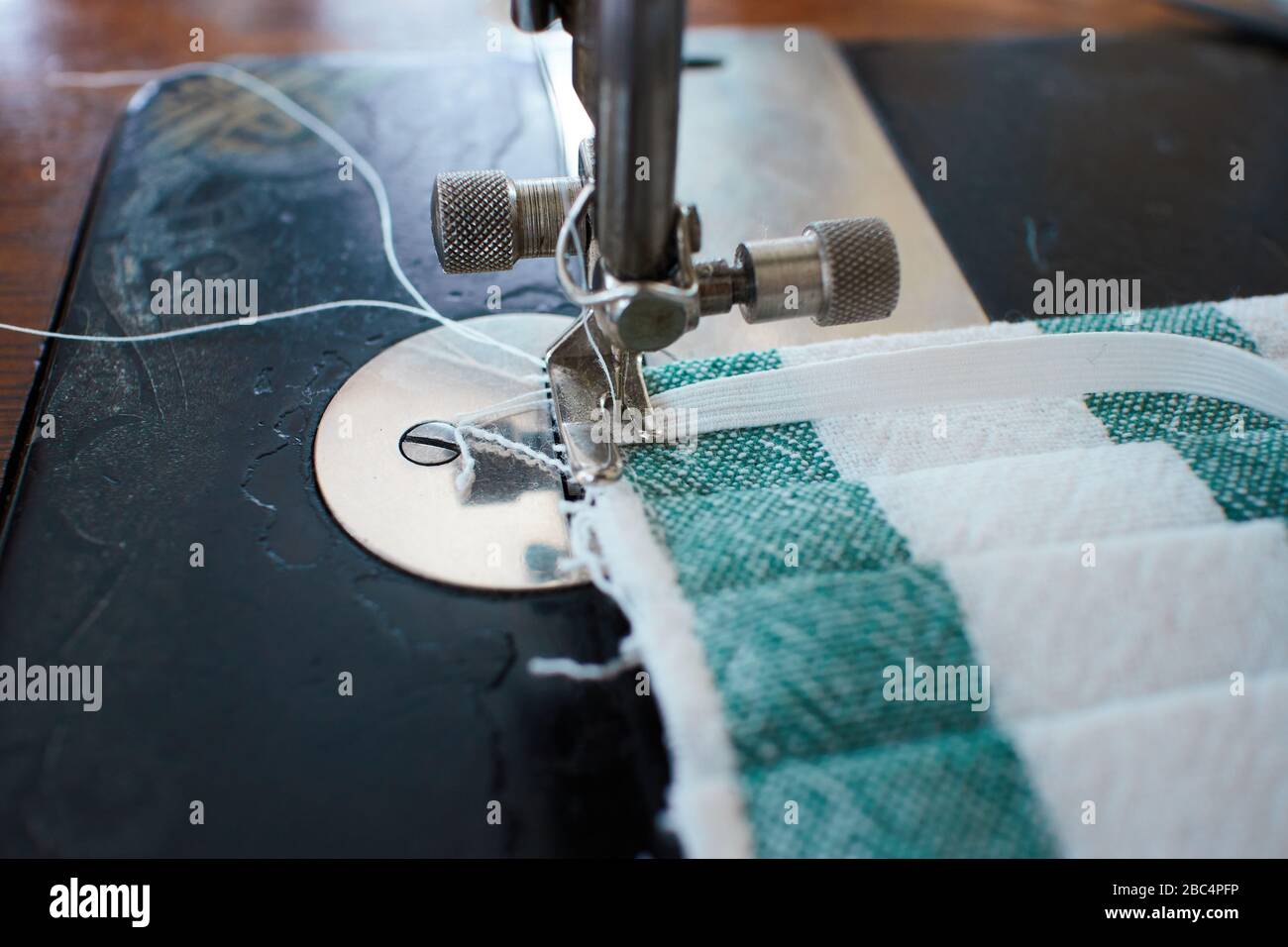 sewing a pleated cloth mask upcycled from a green and white striped ...