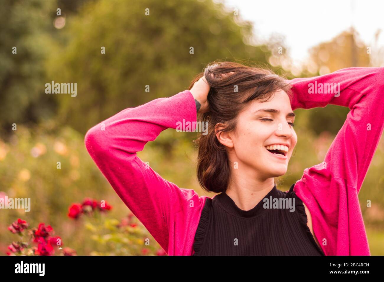 Emotional woman enjoying the sunset outdoors Stock Photo - Alamy