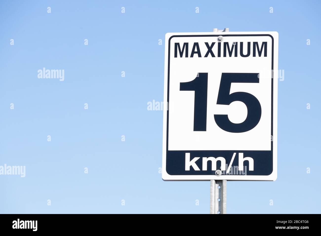15 KM/H speed warning sign isolated with blue sky background Stock ...