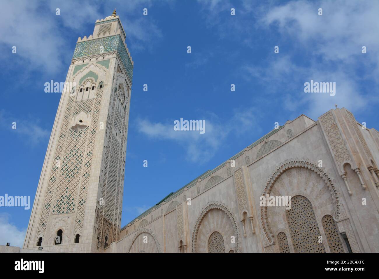 A dramatic exterior shot of the Hassan II Mosque in Casablanca, Morocco ...