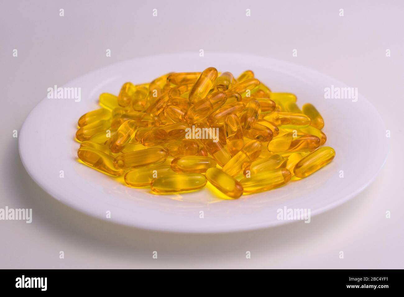 Fish oil tablet plate hi-res stock photography and images - Alamy