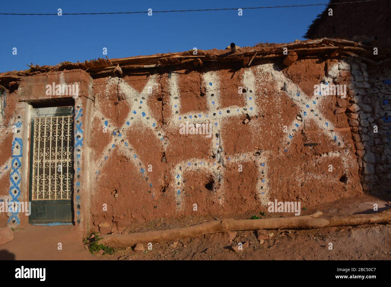 Tamazigh letters shown on the wall of a house in an Amazigh Berber ...