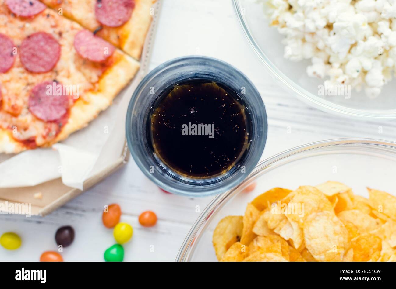 Fast food and unhealthy eating concept. Close up of fastfood snacks ...