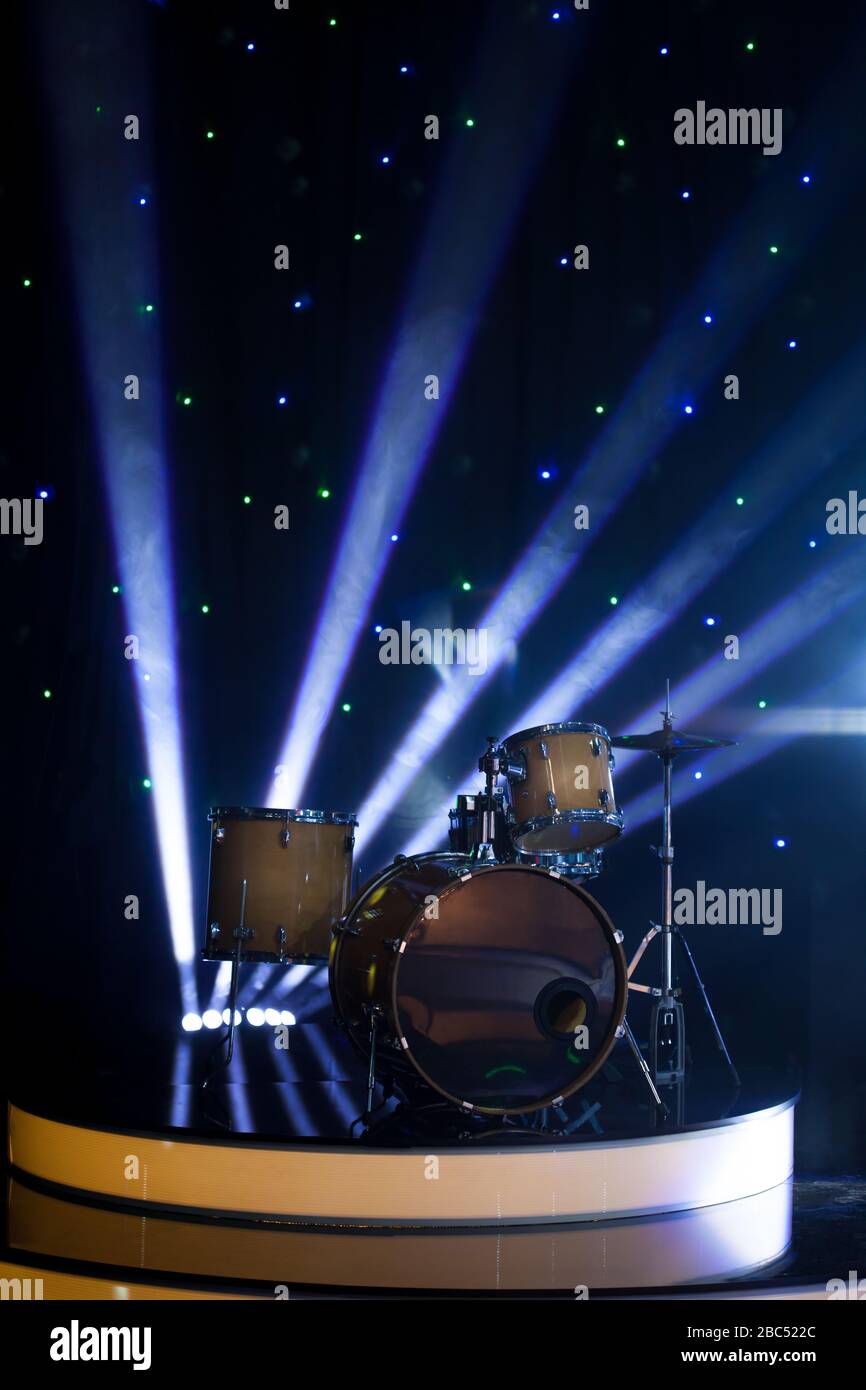 Modern drum set on stage in the spotlight color prepared for playing ...