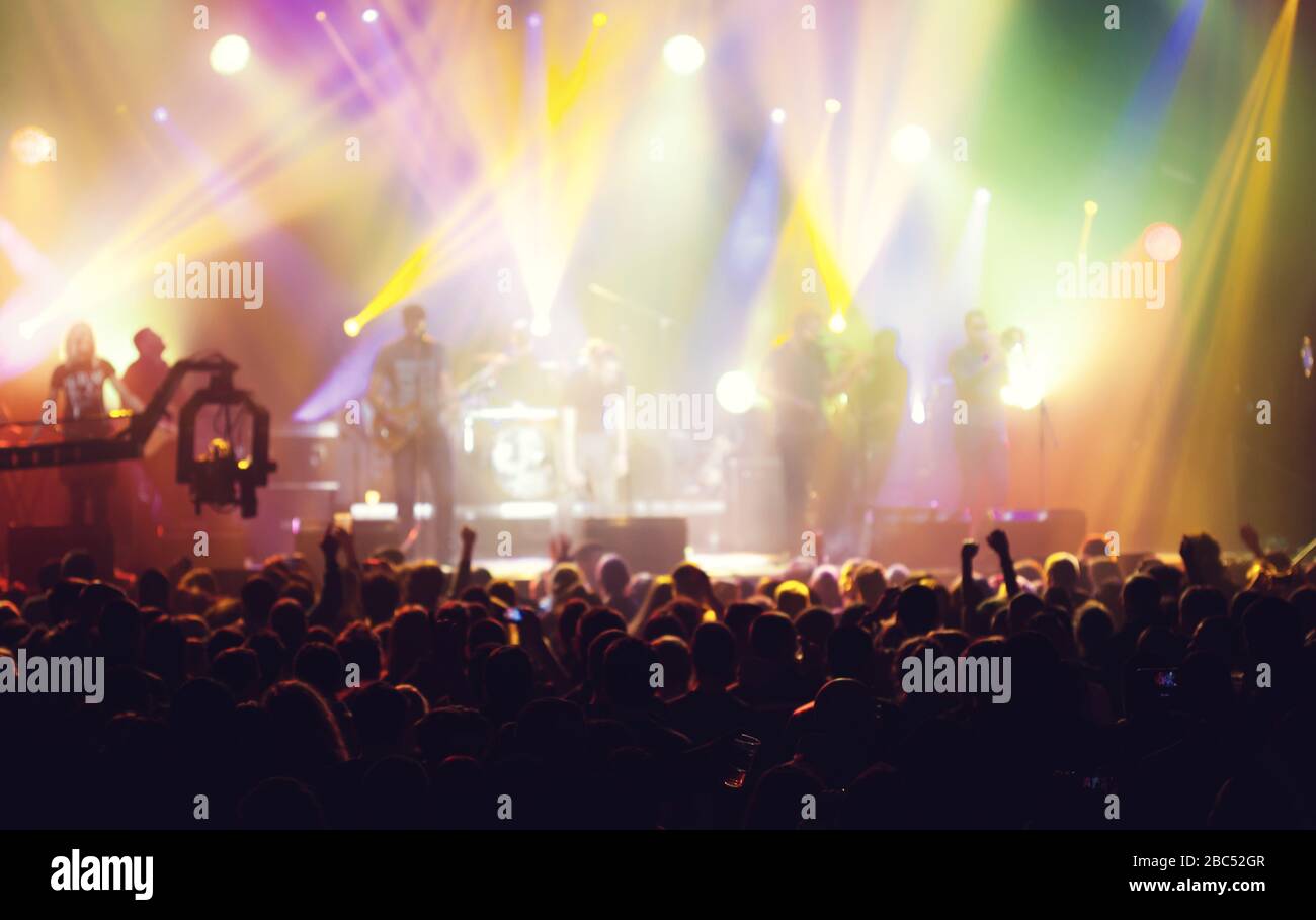 Stage lights on concert. Lighting equipment with multi-colored beams ...