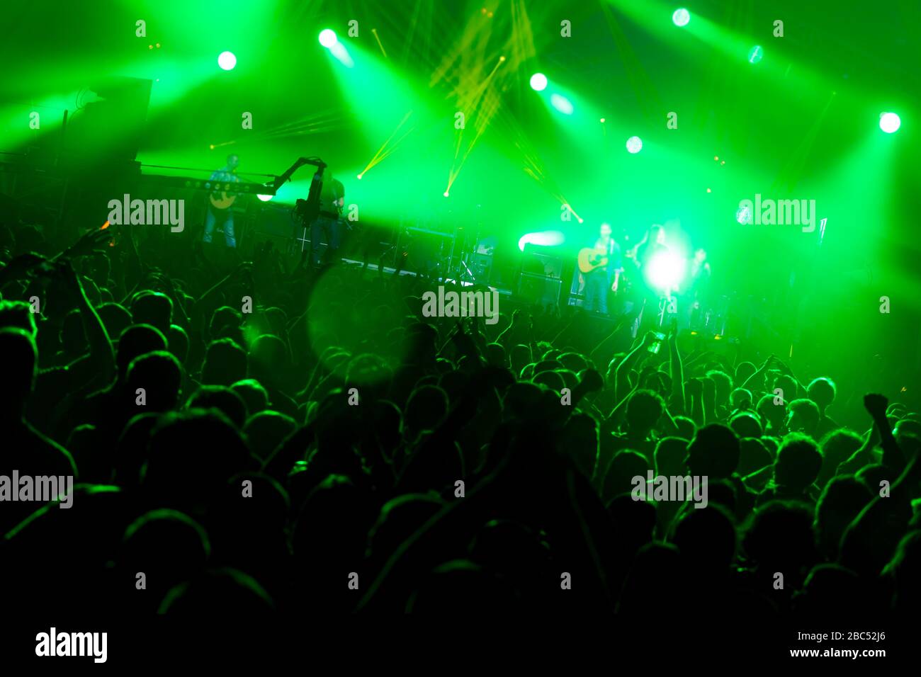 Stage lights on concert. Lighting equipment with multi-colored beams ...