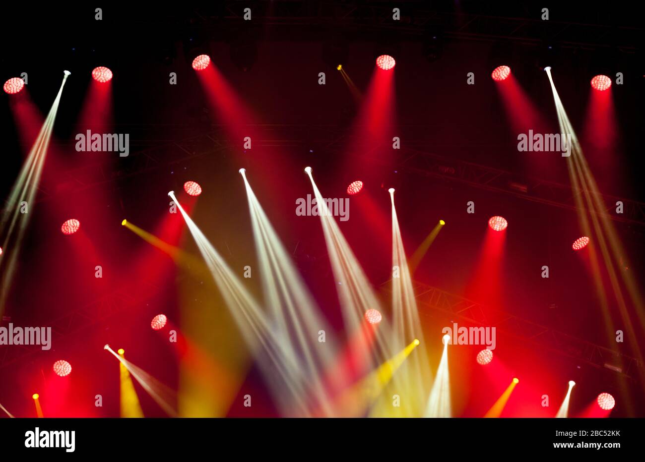 Stage lights on concert. Lighting equipment with multi-colored beams ...