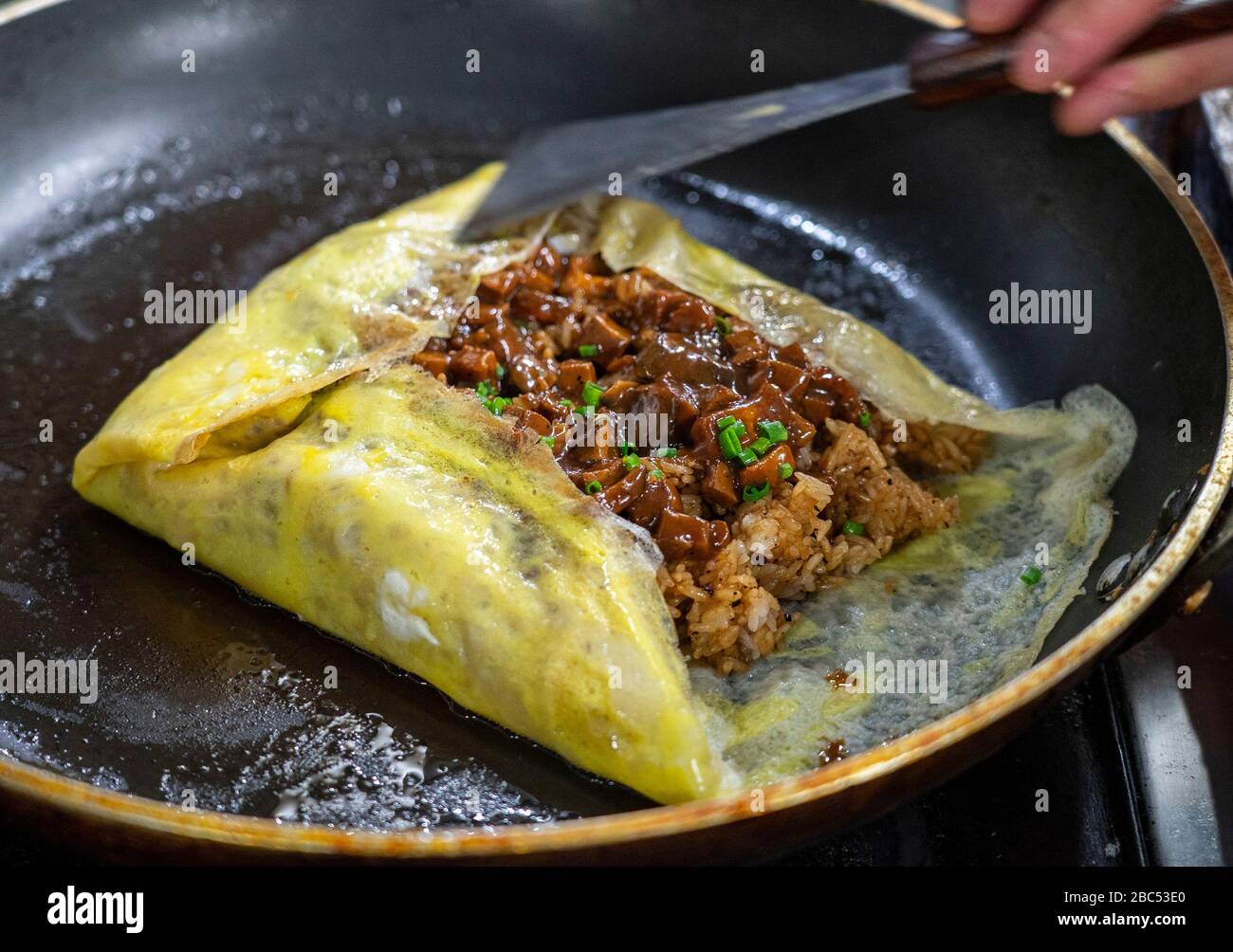Wuhan, China's Hubei Province. 2nd Apr, 2020. A chef makes Wuhan snack ...
