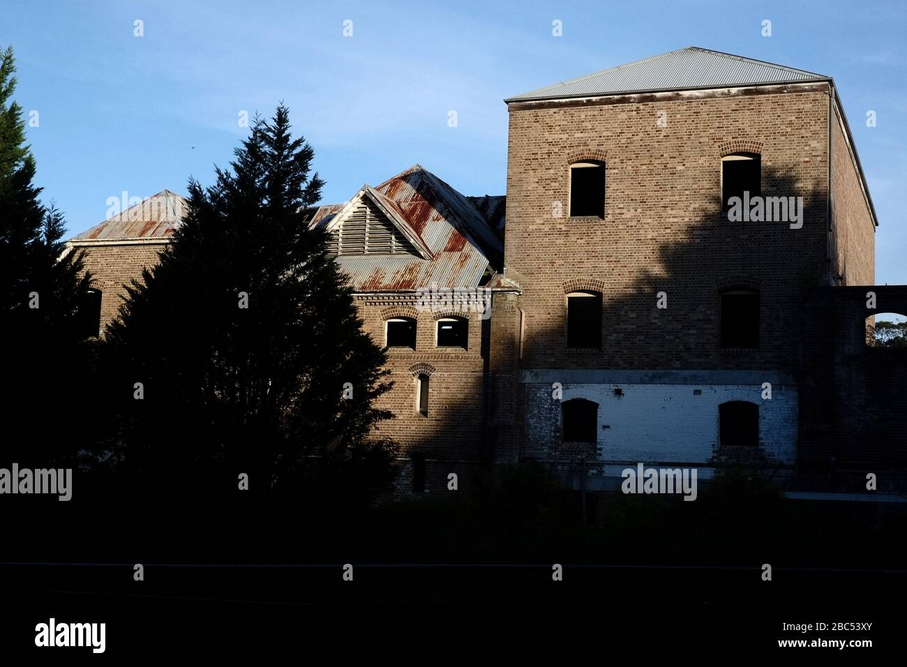 The derelict Maltings, old brick industrial building seen from the ...