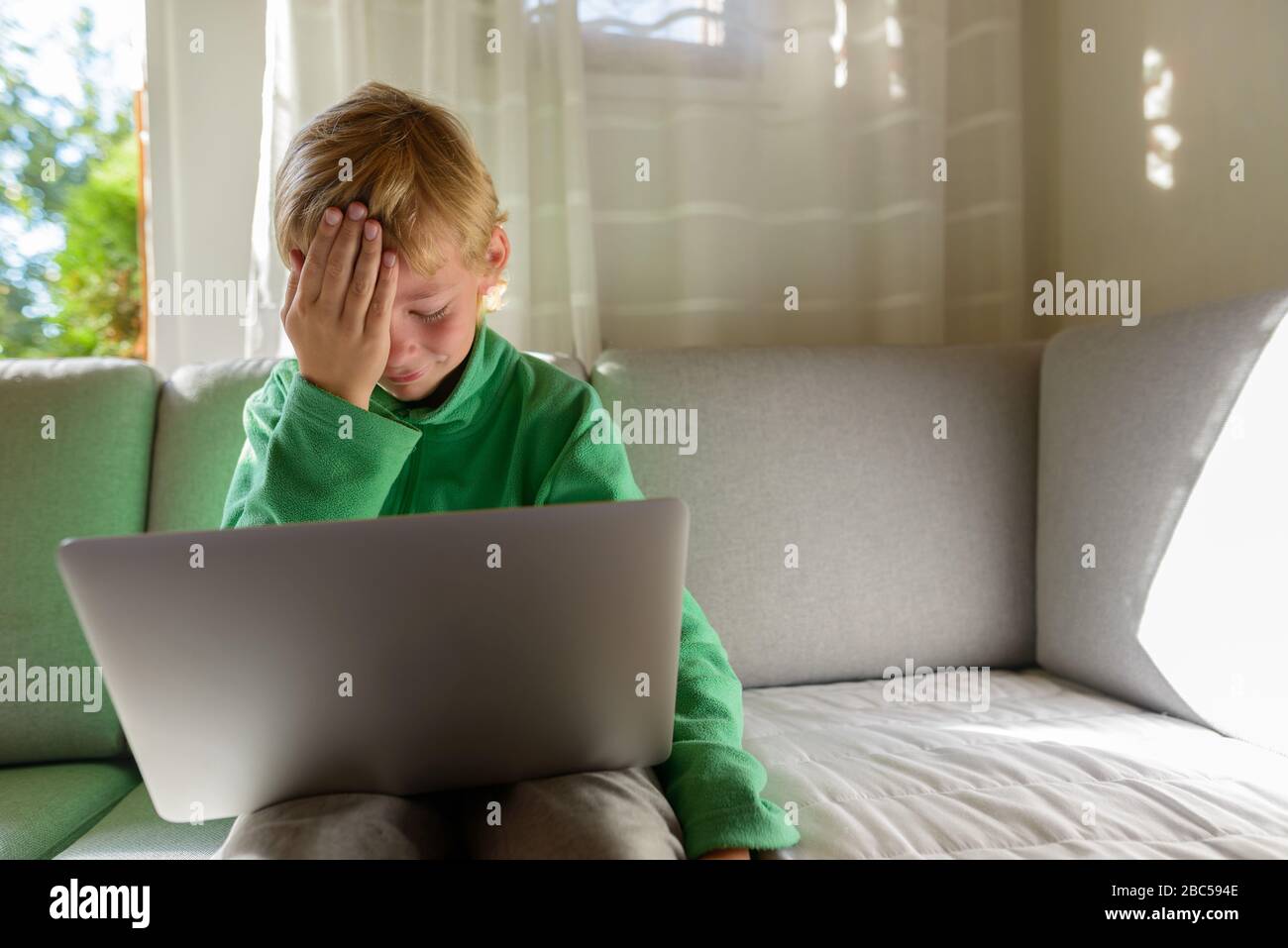 Sad boy computer hi-res stock photography and images - Alamy