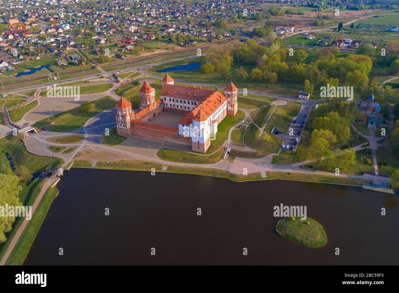 Above Mir Castle on a sunny spring morning (aerial photography). Mir ...