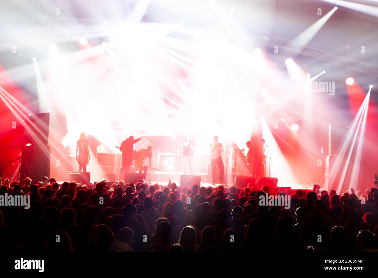 Stage lights on concert. Lighting equipment with multi-colored beams ...