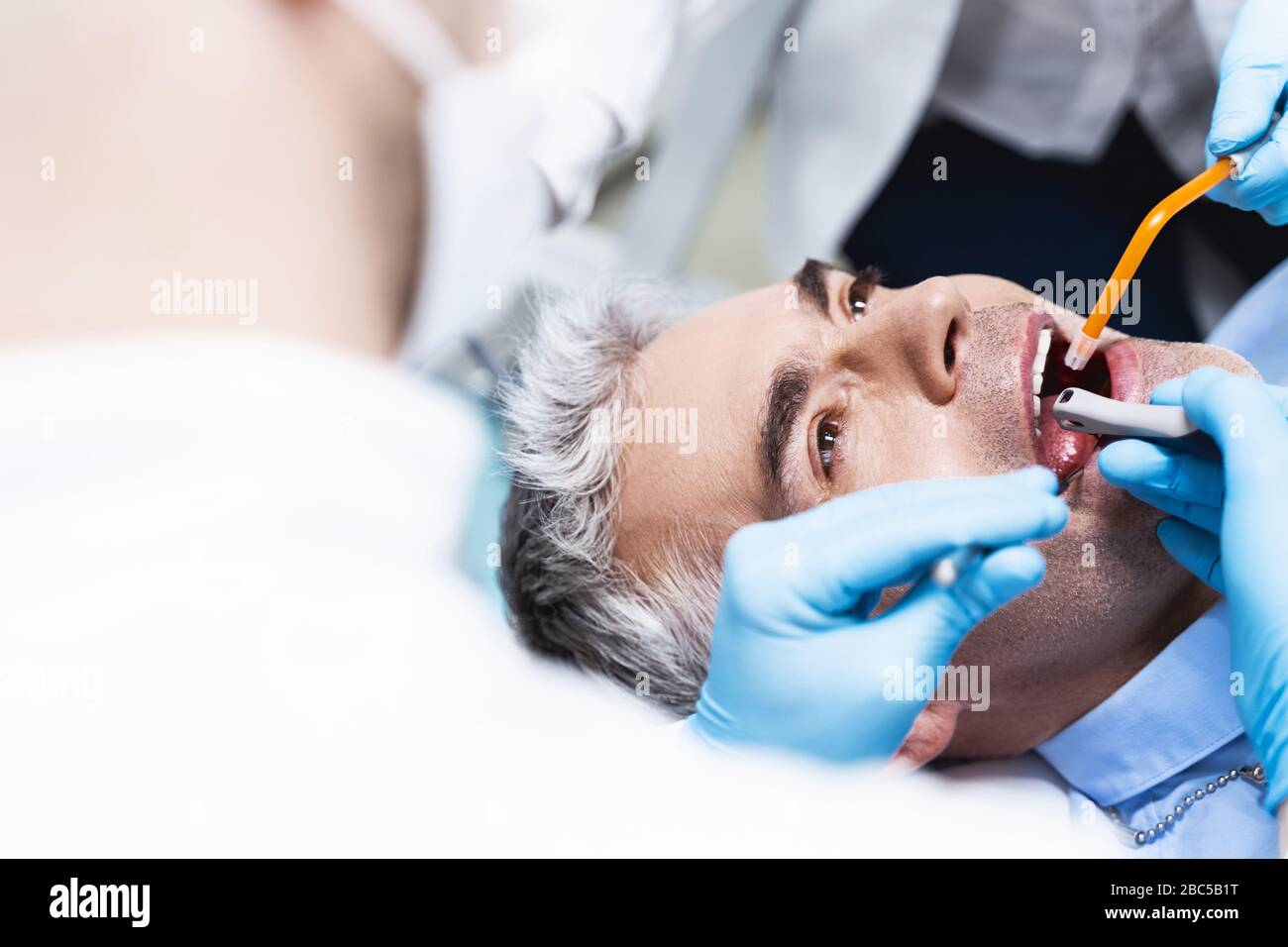 Man having root canal hi-res stock photography and images - Alamy