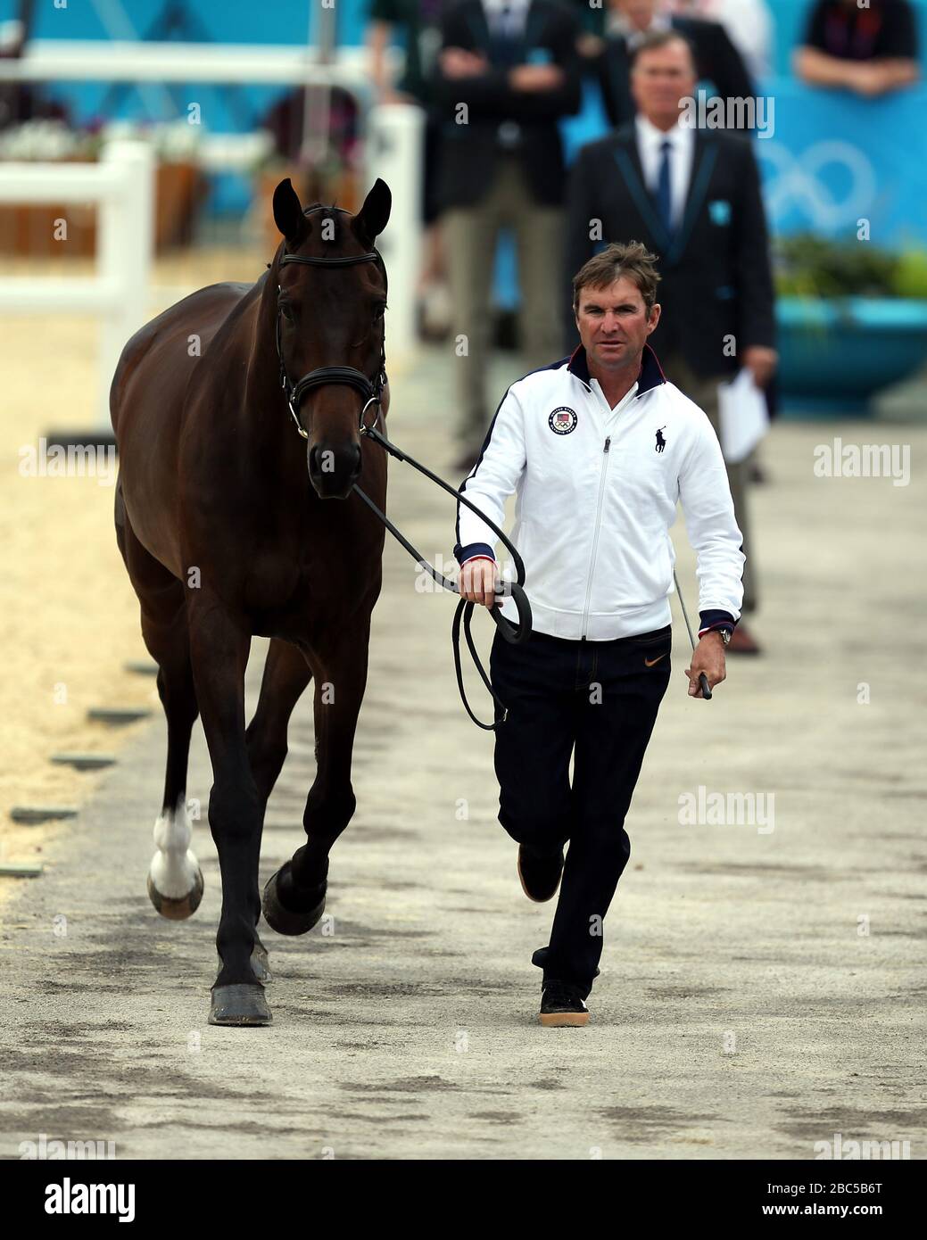 USA's Phillip Dutton with his horse Mystery Whisper takes part in the ...