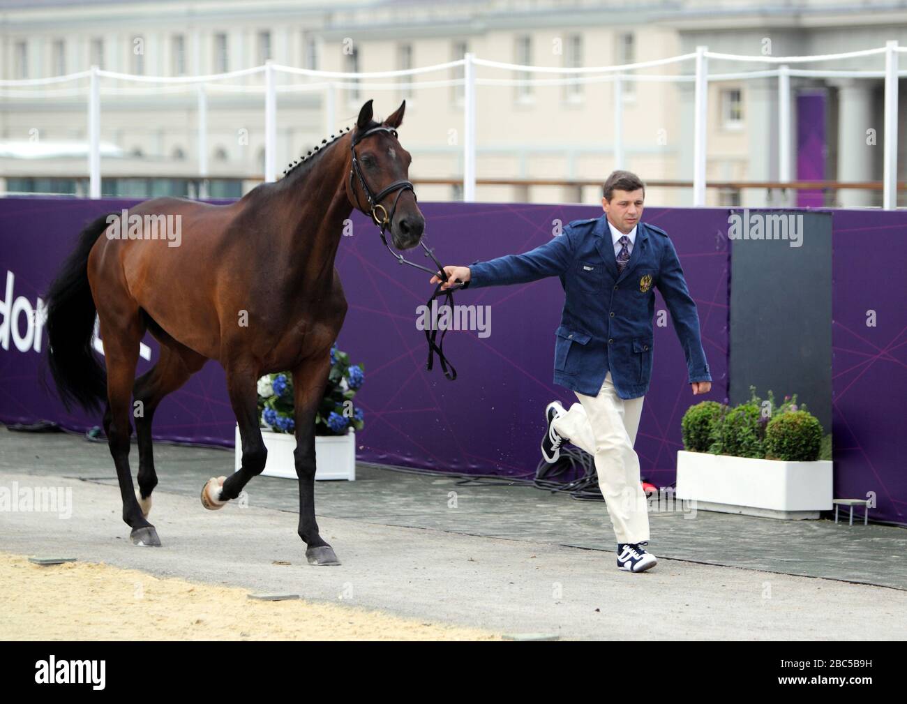 Russian Federation's Mikail Nastenko with his horse Coolroy Piter takes ...