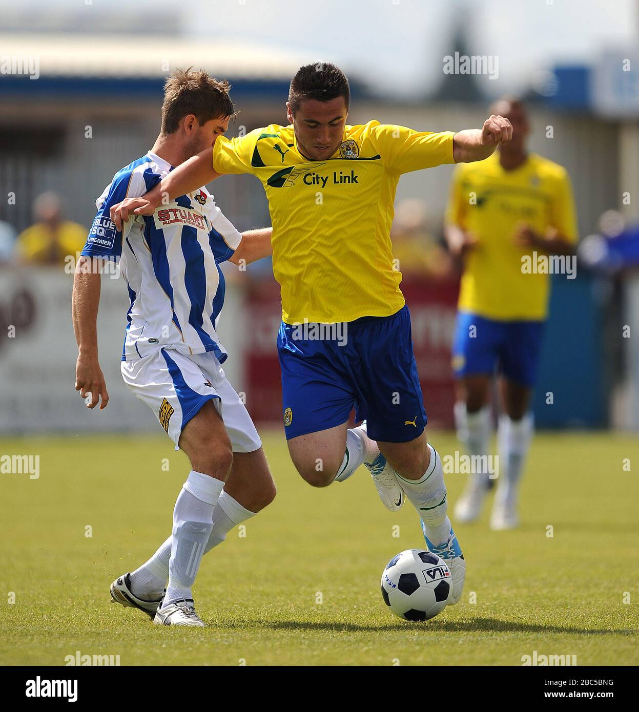 Nuneaton Town's Neil Collett (left) and Coventry City's Callum Ball ...