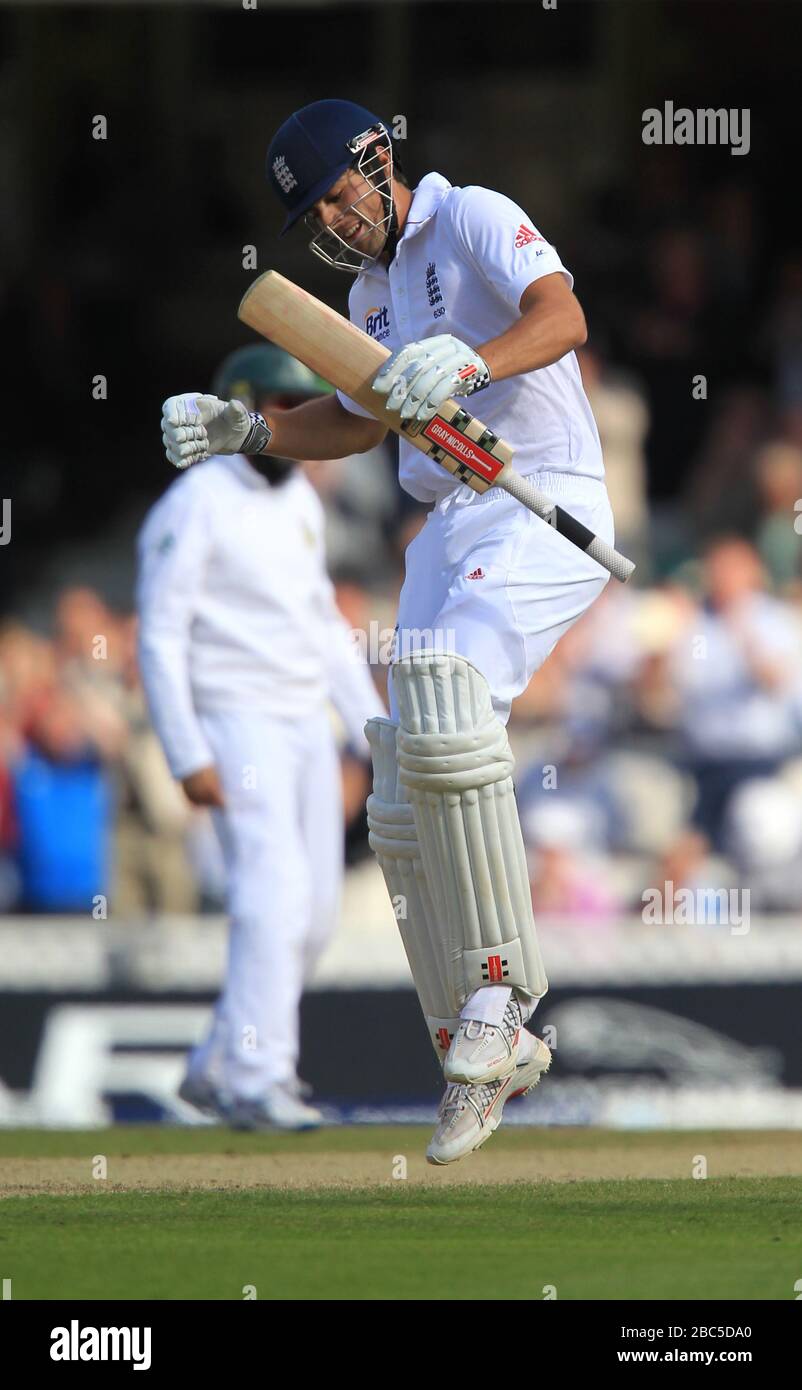 England's Alastair cook celebrates scoring a century Stock Photo - Alamy