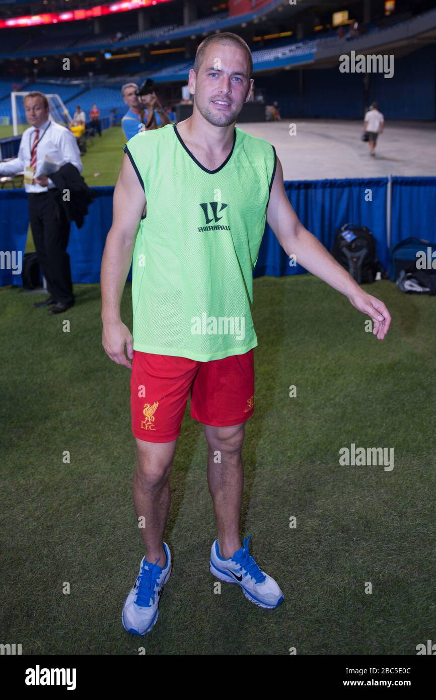 Liverpool Midfielder Joe Cole strikes a pose after the teams 1-1 draw ...