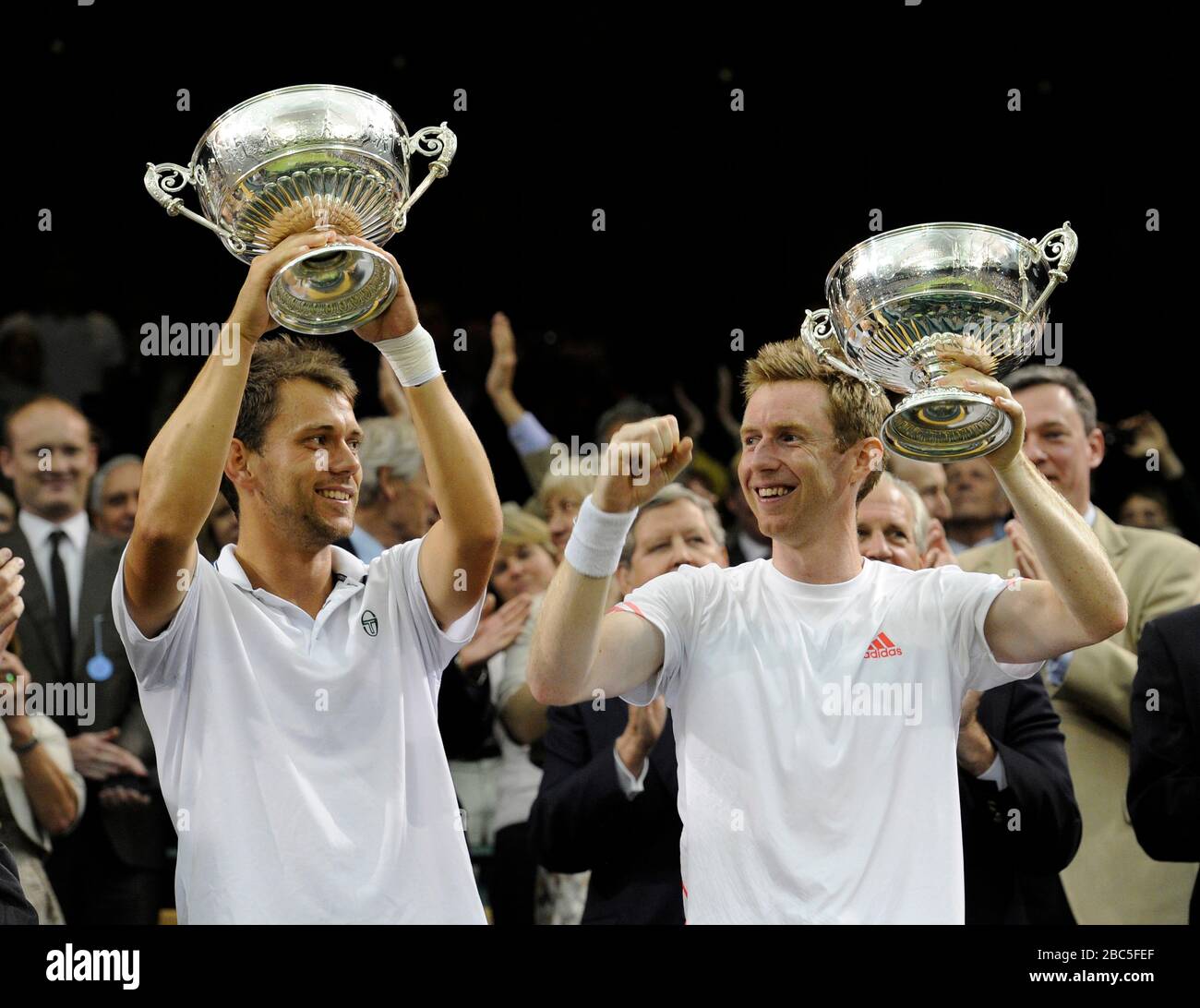 Great Britain's Jonathan Marray (right) and Denmark's Frederick Nielsen celebrate winning the ...