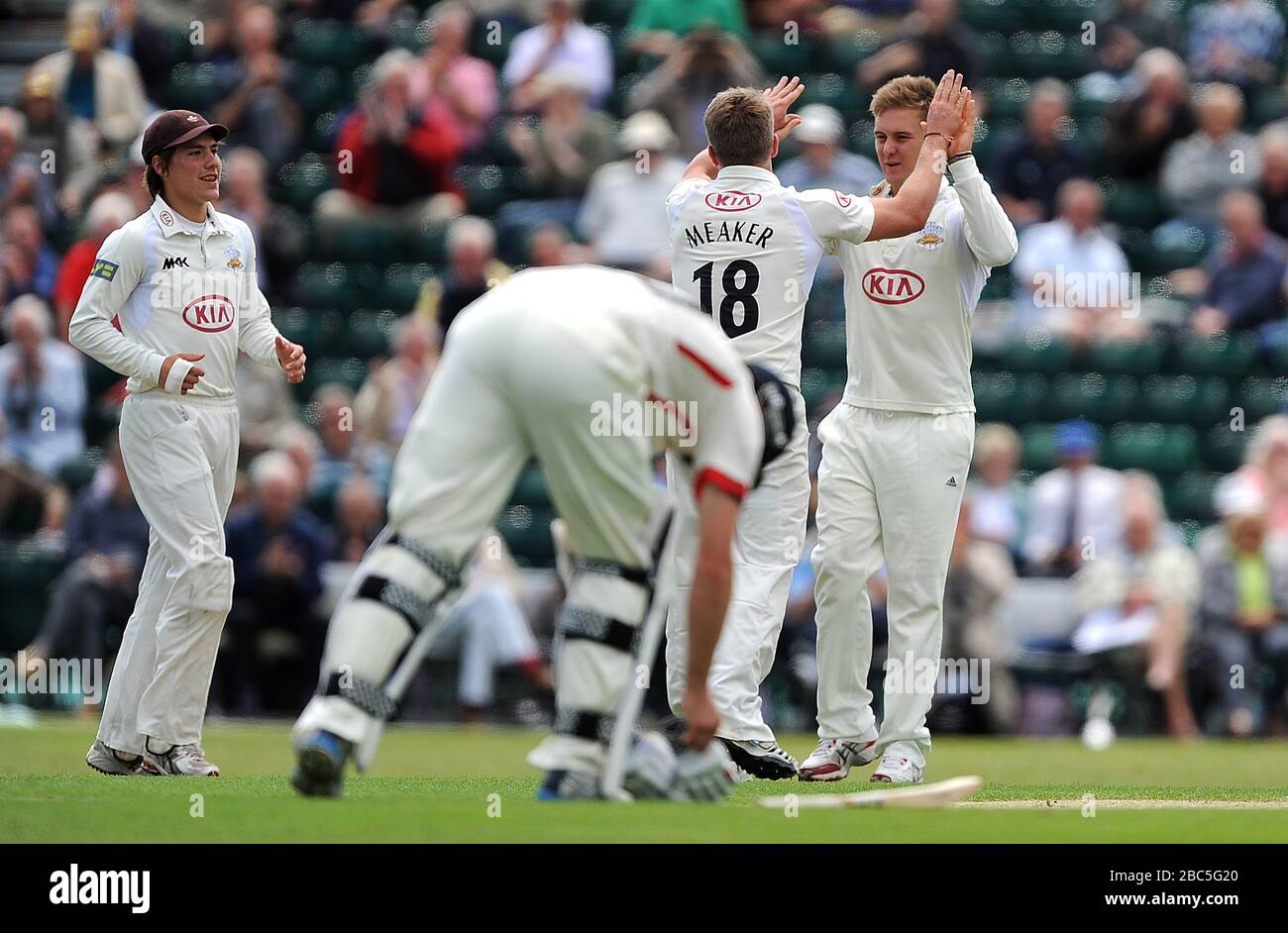 Surrey's Stuart Meaker (18) celebrates with Jason Roy after taking the ...