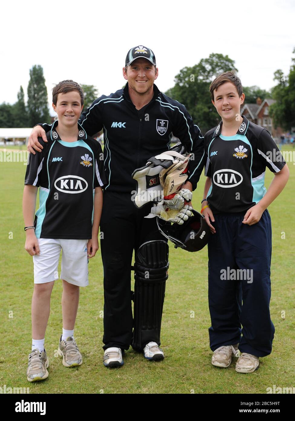 Surrey Lions' Gary Wilson (centre) meets the day's mascots Stock Photo ...
