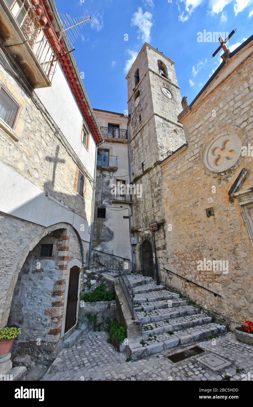 A narrow street between the houses of Pizzone, a village in the Molise ...