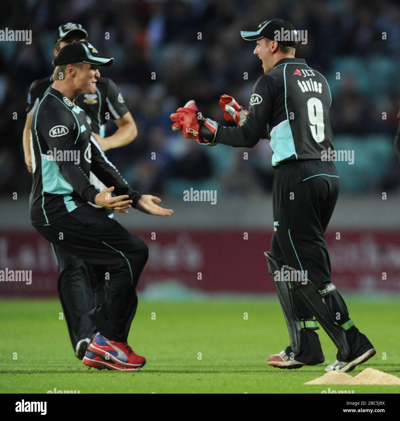 Surrey's Steven Davies (right) celebrates with Stuart Meaker after they ...