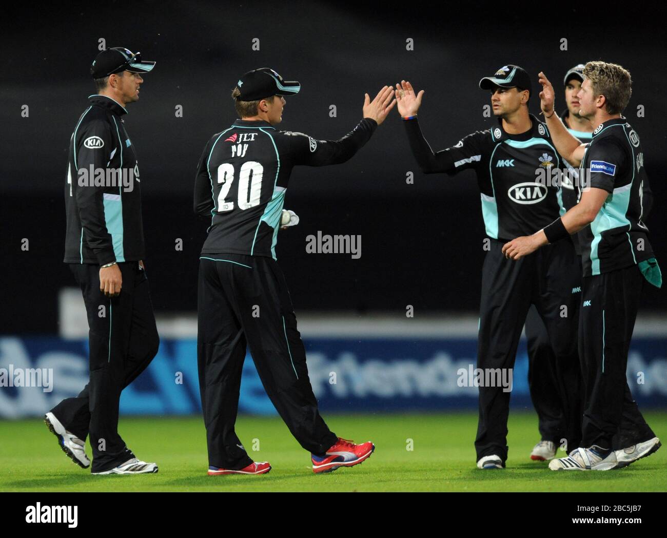 Surrey's Jason Roy (2nd left) celebrates catching Sussex's Matt Prior ...