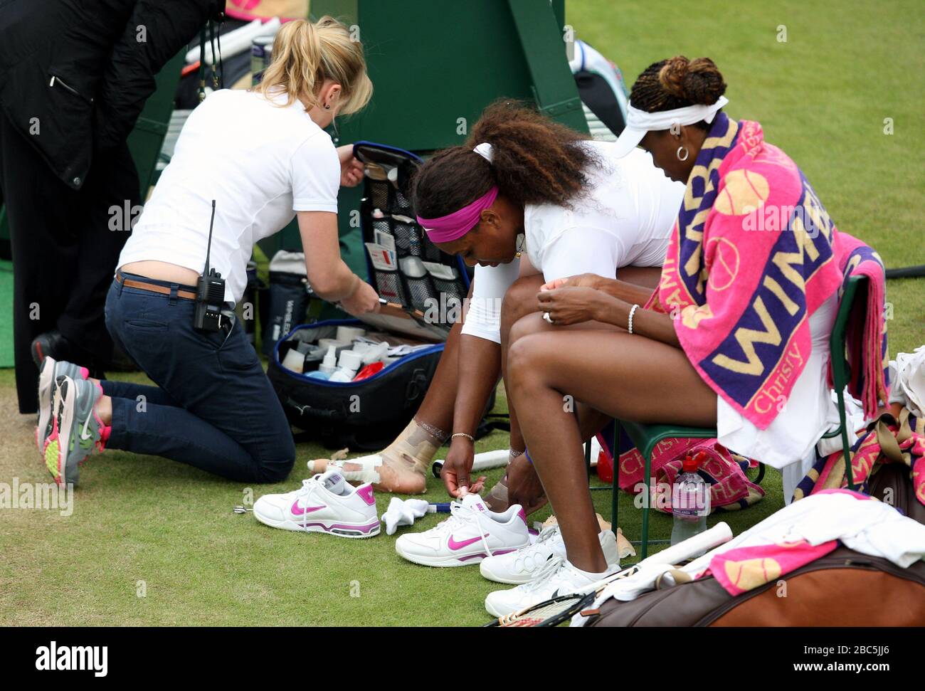 USA's Serena Williams has her ankle treated by a physio during her ...
