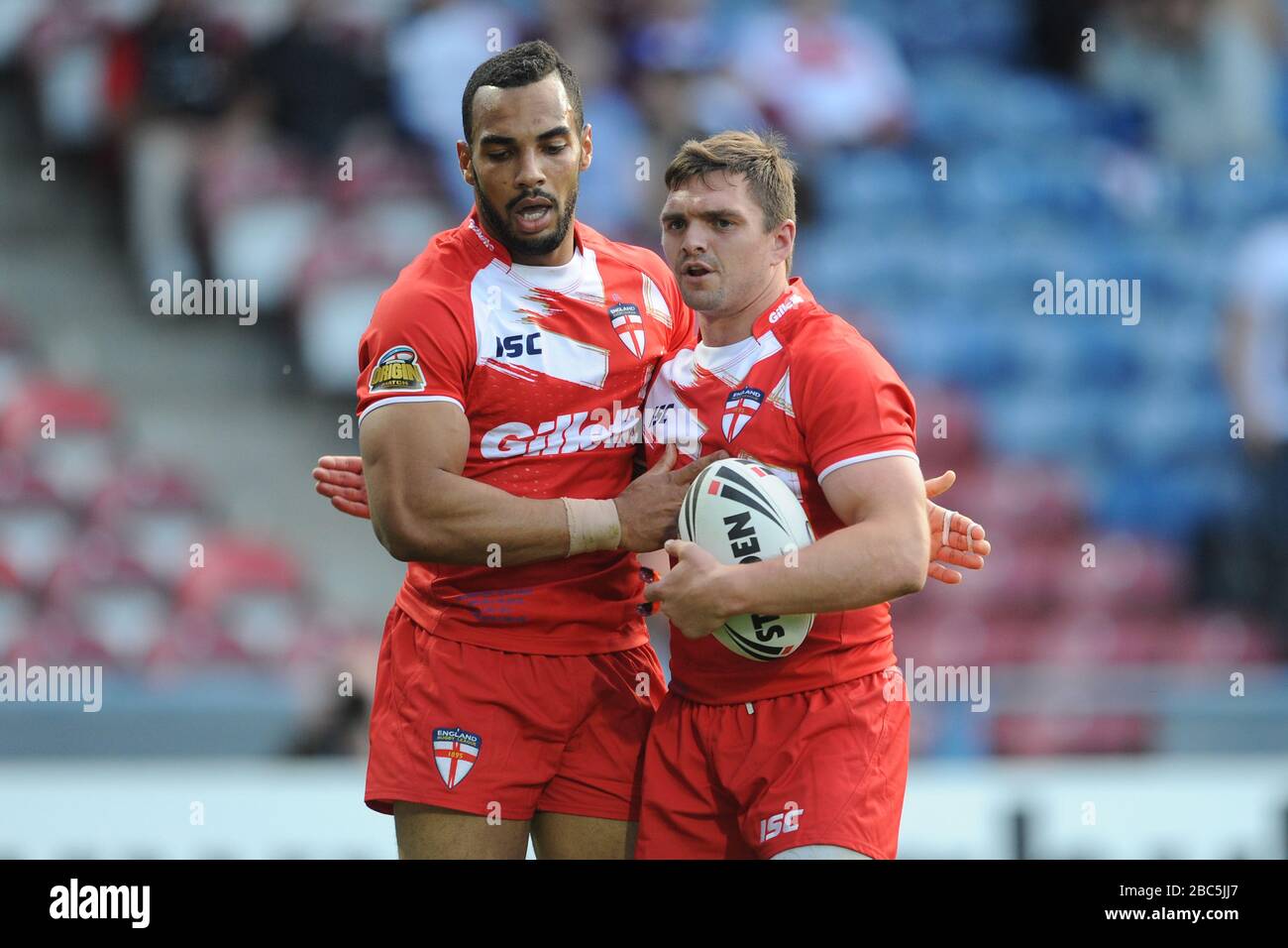 England's Ryan Atkins (left) celebrates his try with Danny Brough Stock ...