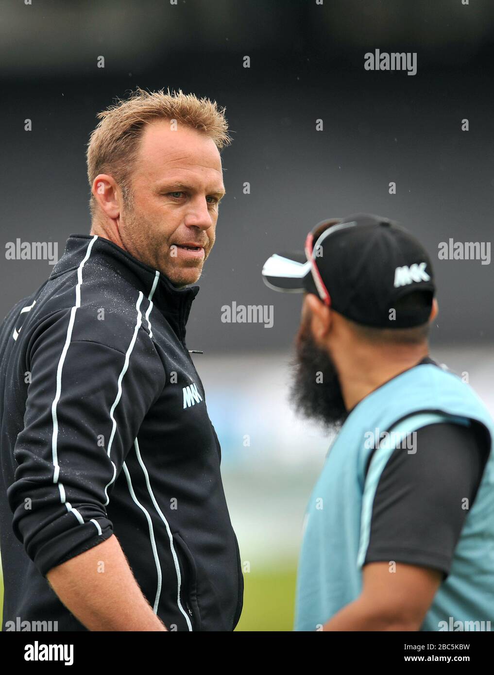 Surrey Lions' head coach Chris Adams (l) talks to Spin Bowling coach ...