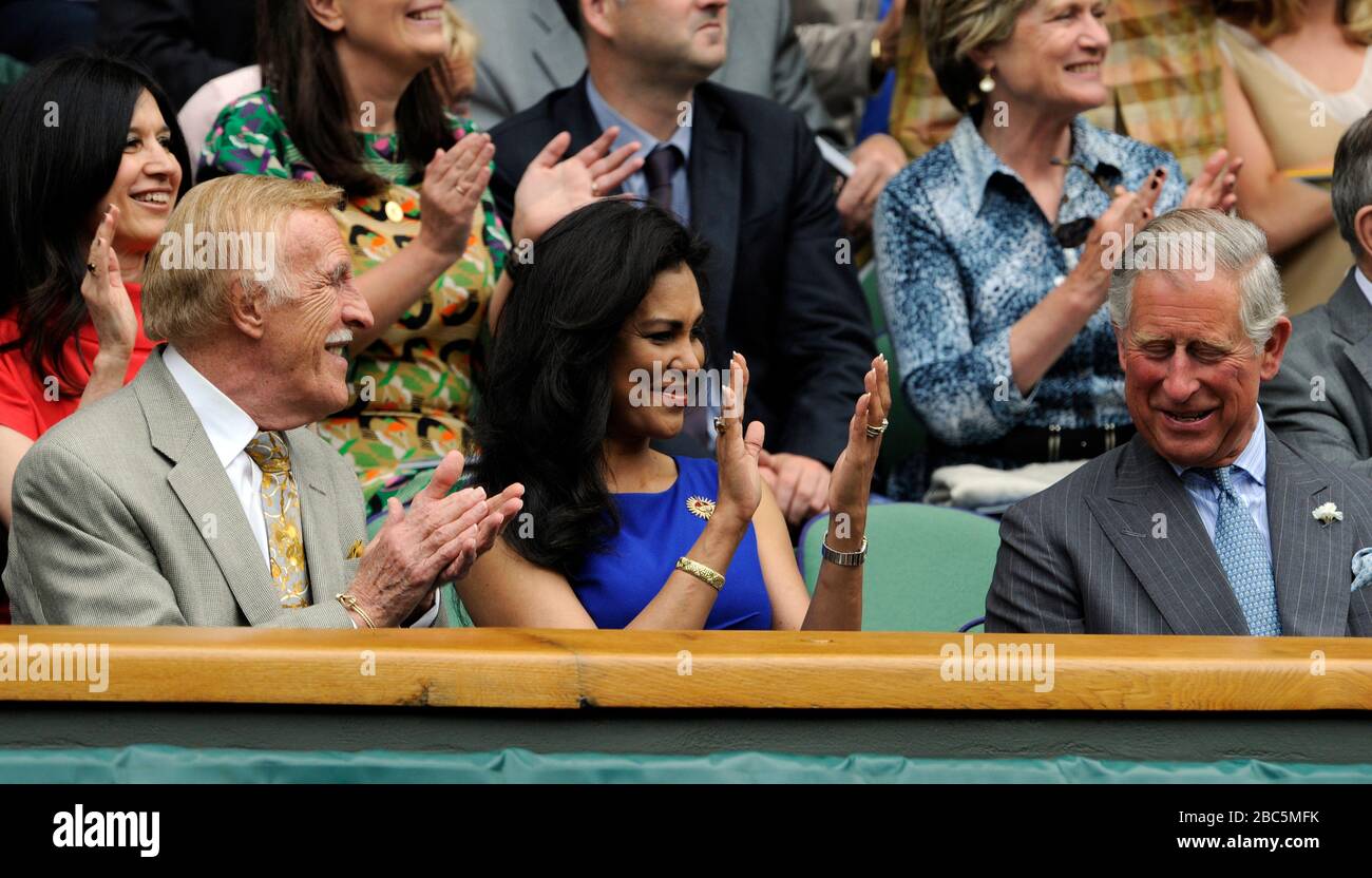 Prince Charles speaks to Sir Bruce Forsyth and his wife Wilnelia in the ...