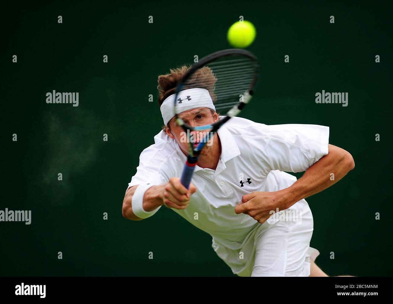 Russia's Igor Andreev in action against Uzbekistan's Denis Istomin Stock Photo - Alamy