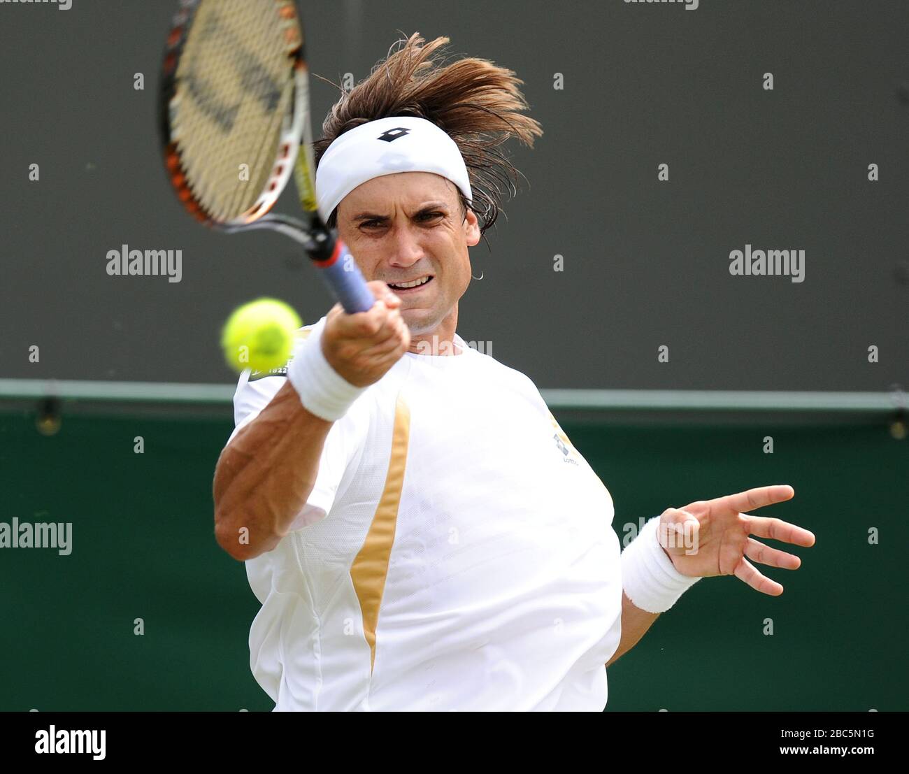 Spain's David Ferrer in action against France's Kenny De Schepper Stock ...