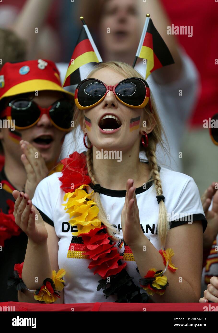 A German fan shows her support, in the stands prior to kick-off Stock ...