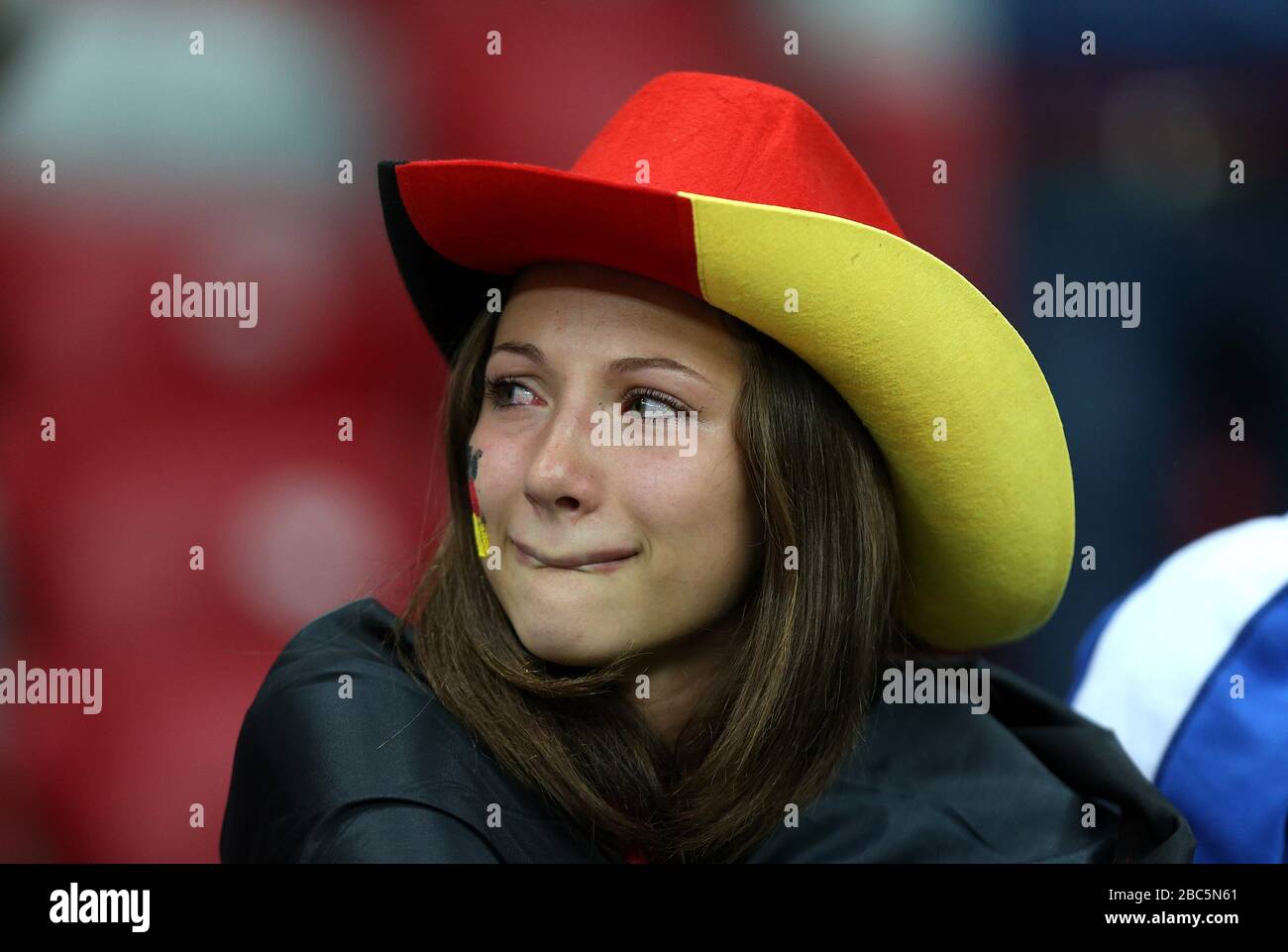 A fan looks dejected in the stands hi-res stock photography and images ...