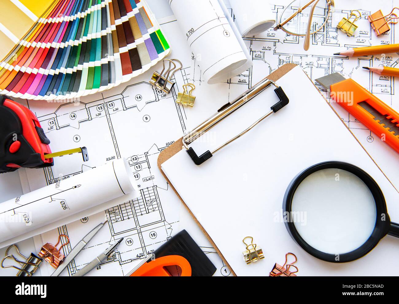 Architect workplace top view. Architectural project, blueprints ...