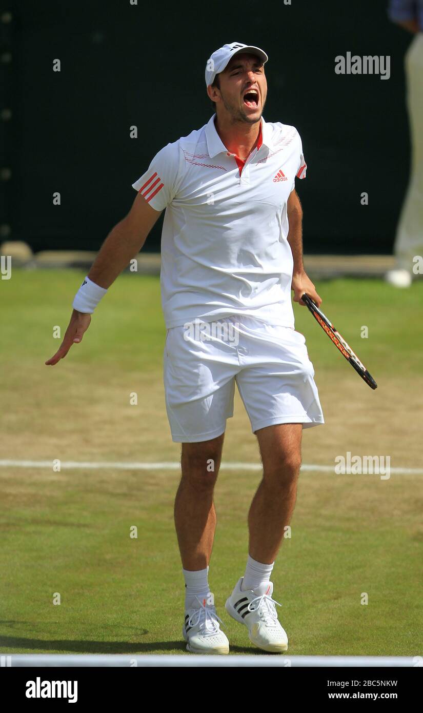 Serbia's Viktor Troicki celebrates defeating Argentina's Juan Monaco ...