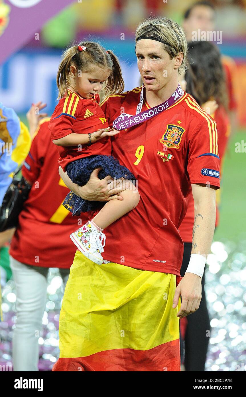 Spain's Fernando Torres celebrates victory with his daughter after the ...