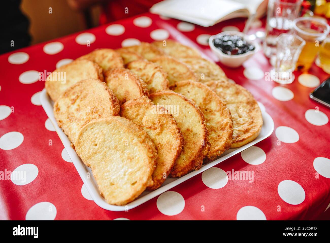 Fried bread breakfast with fruit jam. Balkan food. Bulgarian ...