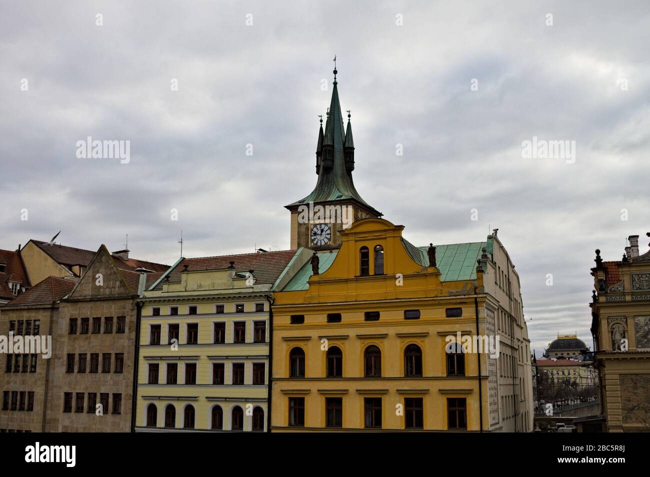 Old bohemian buildings with decorated roofs and spires (Prague, Czech ...