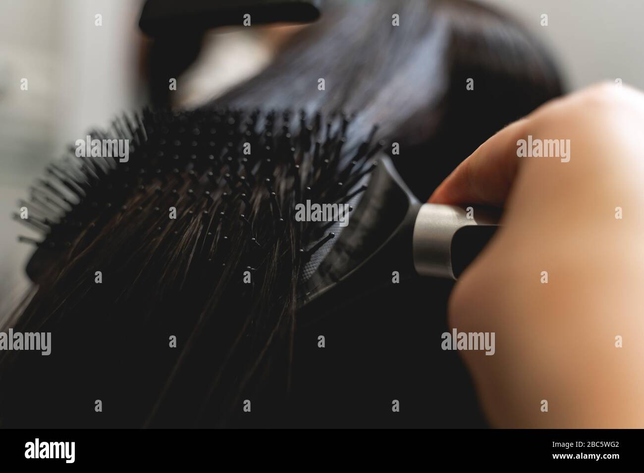 Girl hairdryer comb brushing hi-res stock photography and images - Alamy