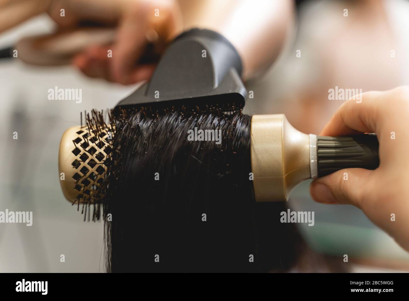 Close up hairdresser combing woman hi-res stock photography and images ...