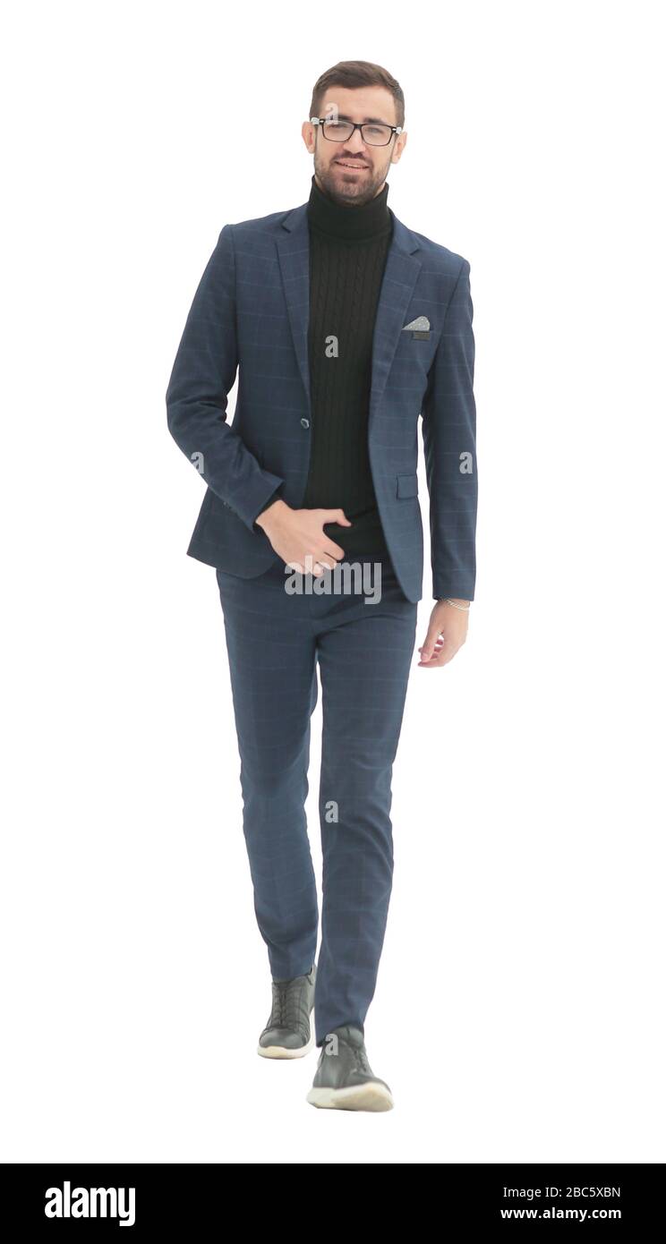 in full growth. confident business man taking a step forward Stock ...